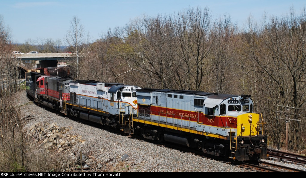 DL 2452 leads mixed frieght PT 98 towards Slatington Jct, PA
